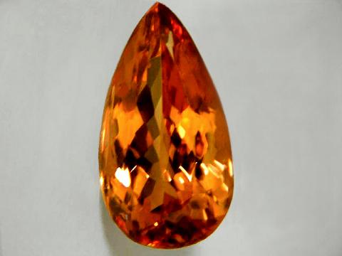 Topaz Gemstones - sky blue, colorless, and natural golden-orange-pink ...